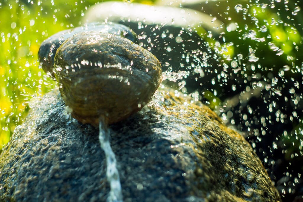 Add Serenity to Your Yard with a Bubbling Boulder Water Feature